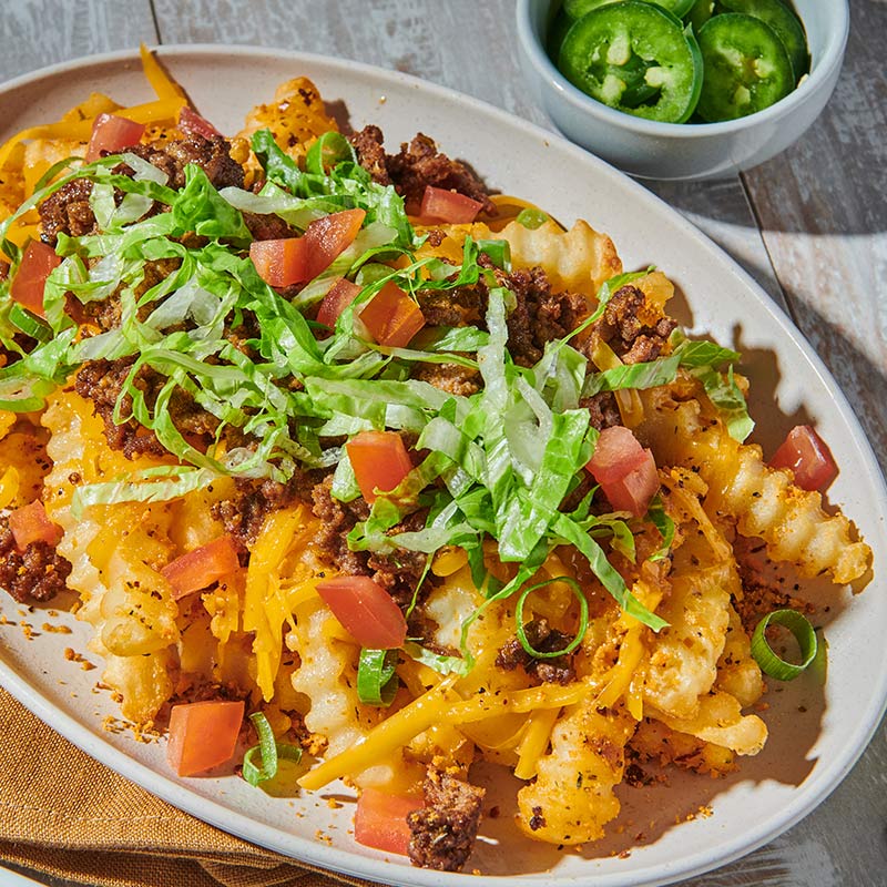 Frites garnies façon taco au fromage | Club House CA FR